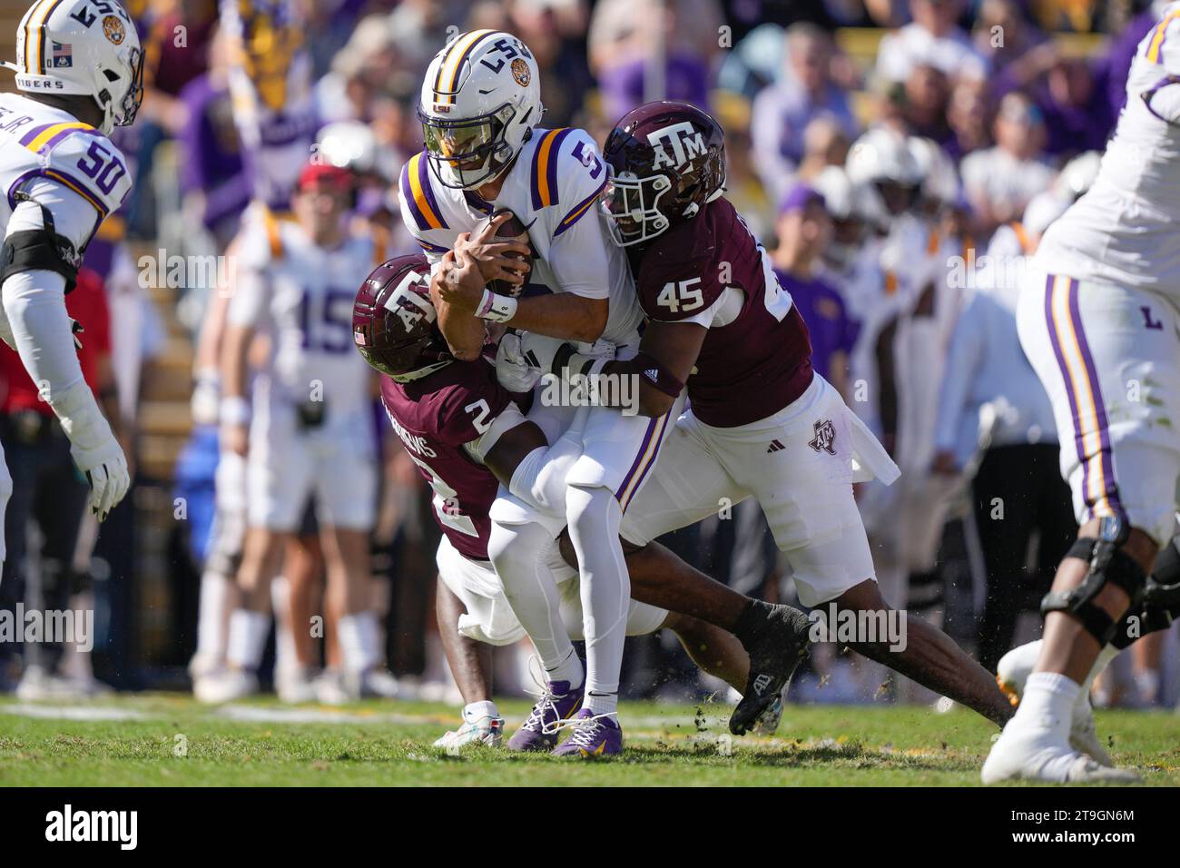 LSU quarterback Jayden Daniels (5) is sacked by Texas A&M linebacker ...