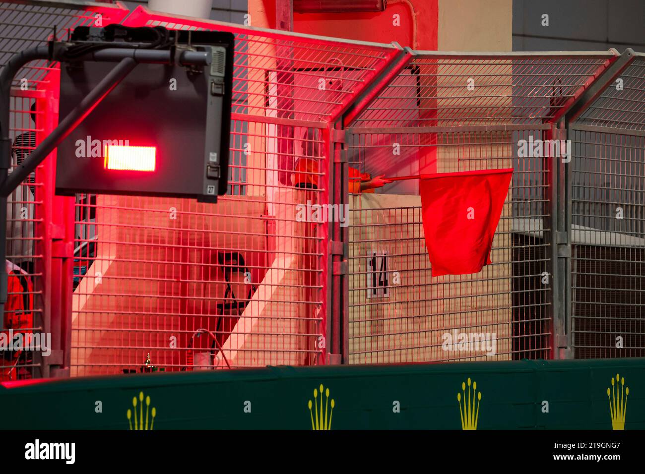 Abu Dhabi, United Arab Emirates. 24th Nov, 2023. Marshal waves red flag ...