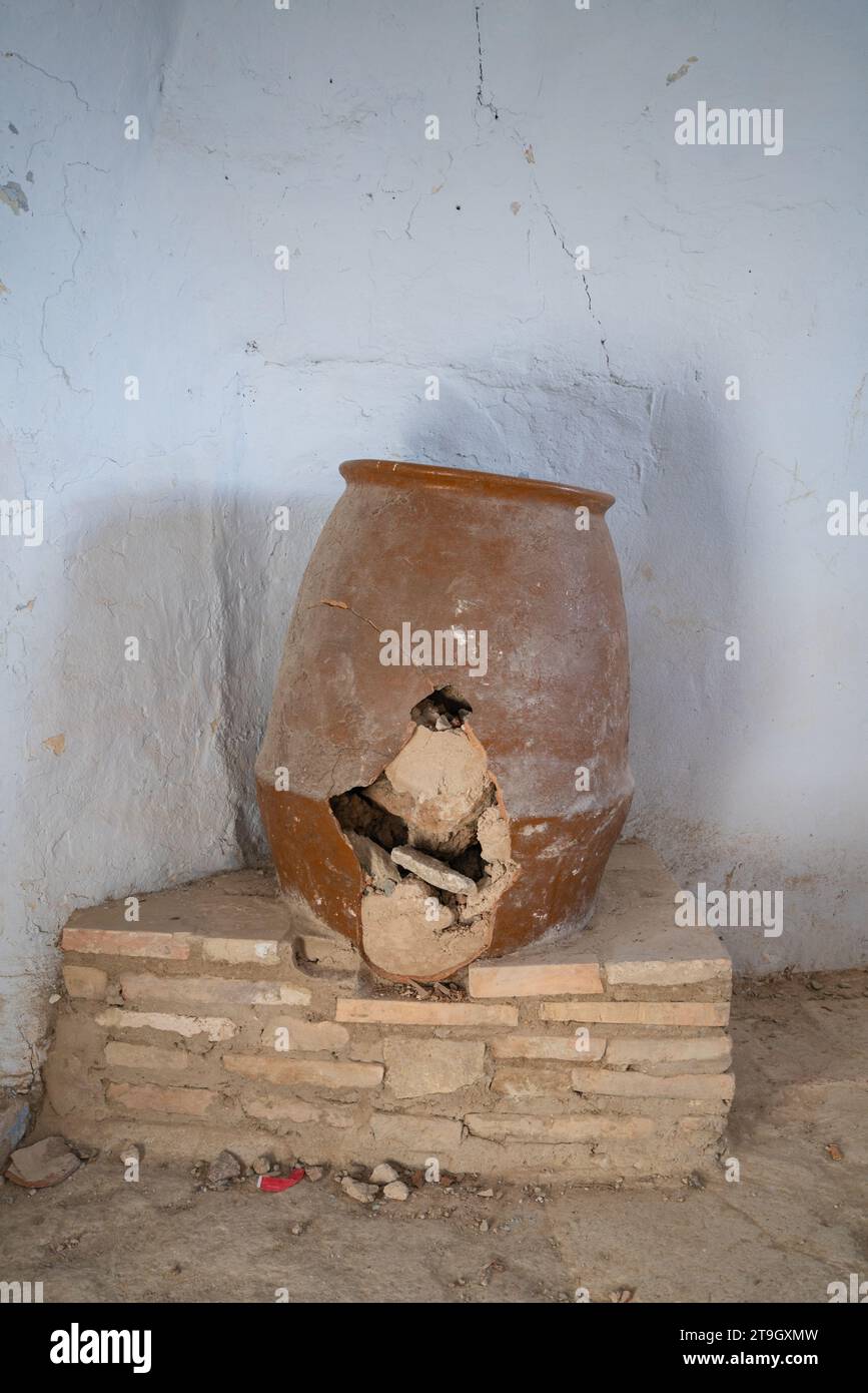 Argueda caves abandoned interior with old broken vase and white wallks ...