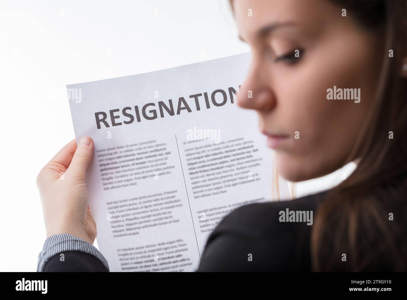 Businesswoman faces the gravity of her resignation Stock Photo - Alamy