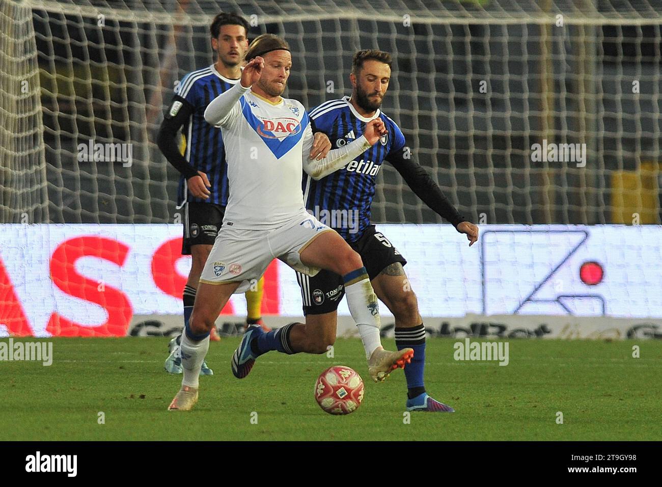 Pisa, Italy. 25th Nov, 2023. Birkir Bjarnason (Brescia) Andrea Barberis (Pisa) during Pisa SC vs ...