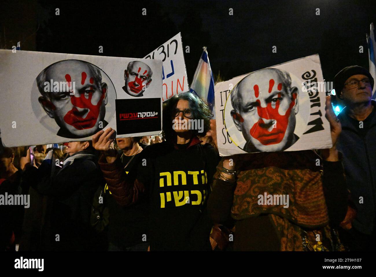 Jerusalem, Israel. 25th Nov, 2023. Israelis hold posters and chant ...