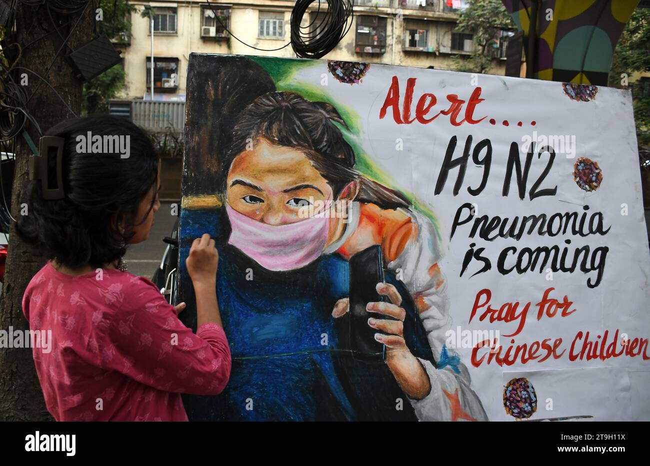 Student from Gurukul school of art paints a poster that creates ...