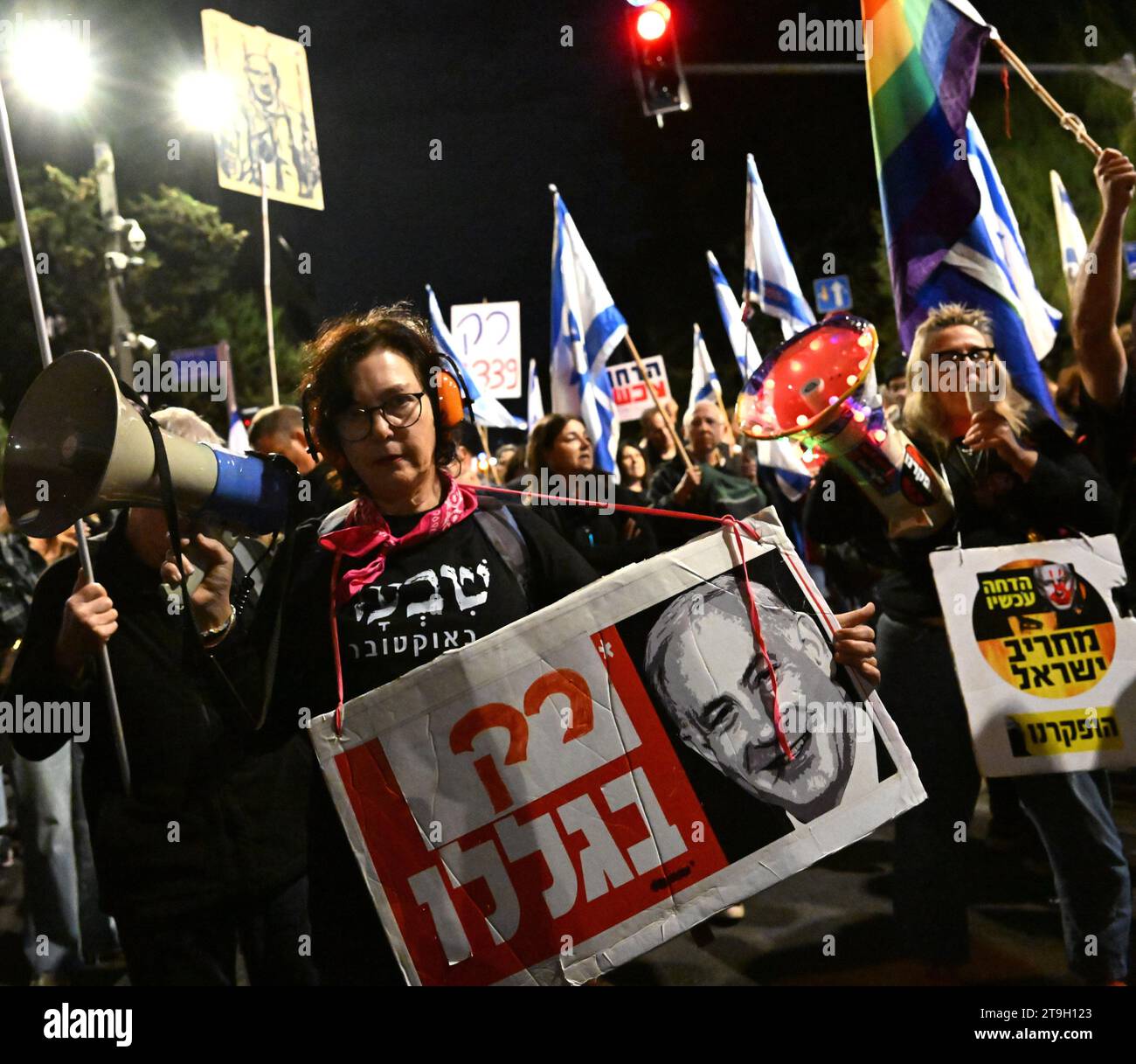 Jerusalem, Israel. 25th Nov, 2023. Israelis hold posters and chant ...