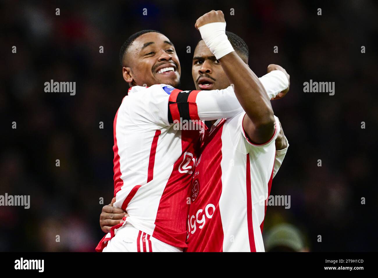 AMSTERDAM - (l-r) Steven Bergwijn of Ajax, Jorrel Hato of Ajax celebrate the 1-0 during the ...