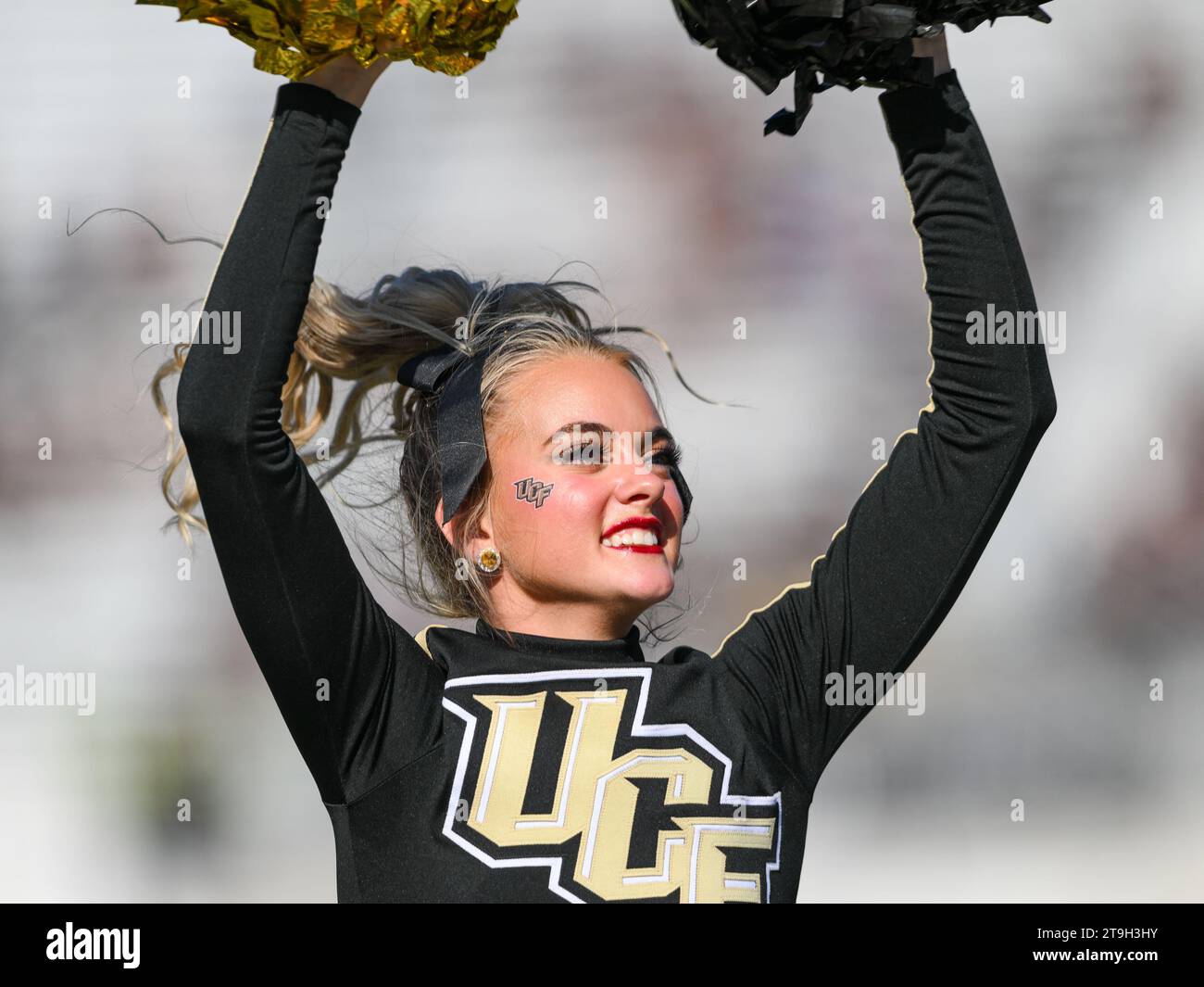 November 25, 2023: UCF Knights cheer member performs during second half ...