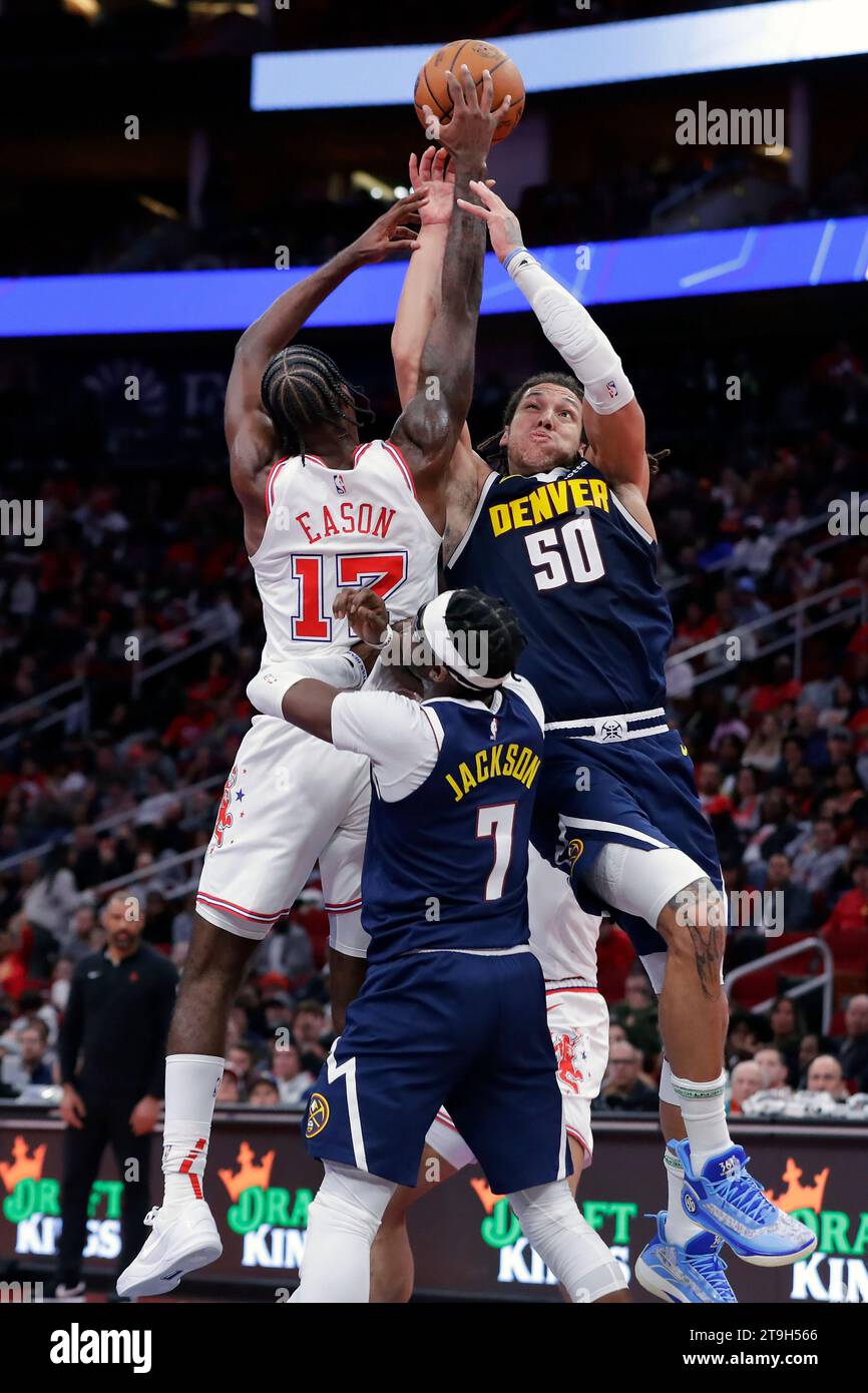 Houston Rockets forward Tari Eason (17) and Denver Nuggets forward ...