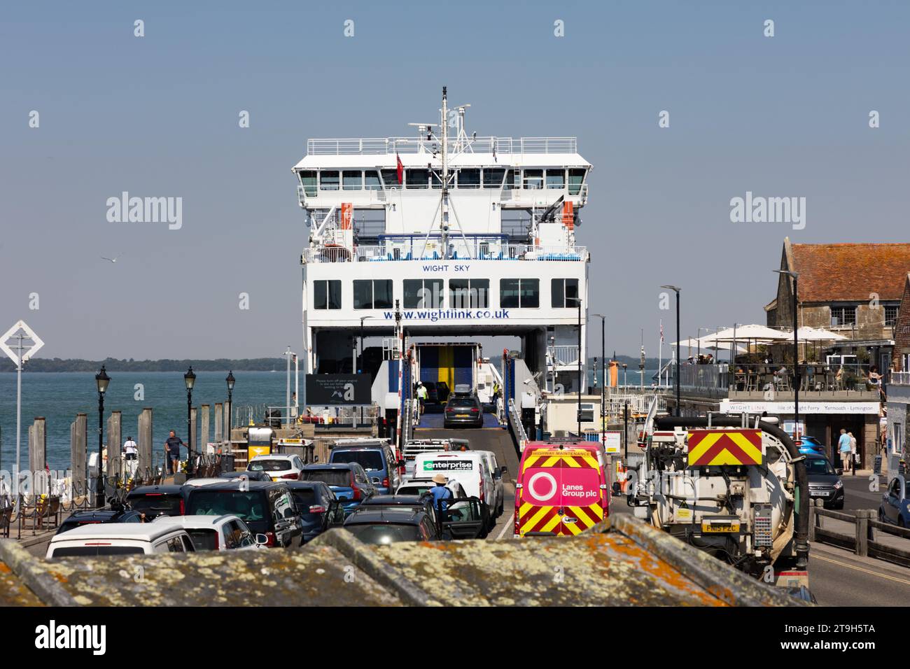 Cars waiting to board the Isle of Wight Ferry at Yarmouth on the Isle ...