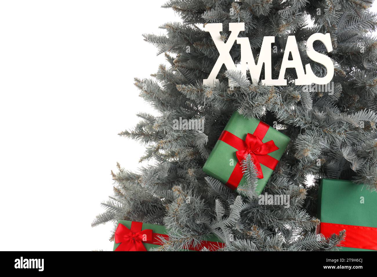 Beautiful Christmas tree decorated gift boxes on white background ...