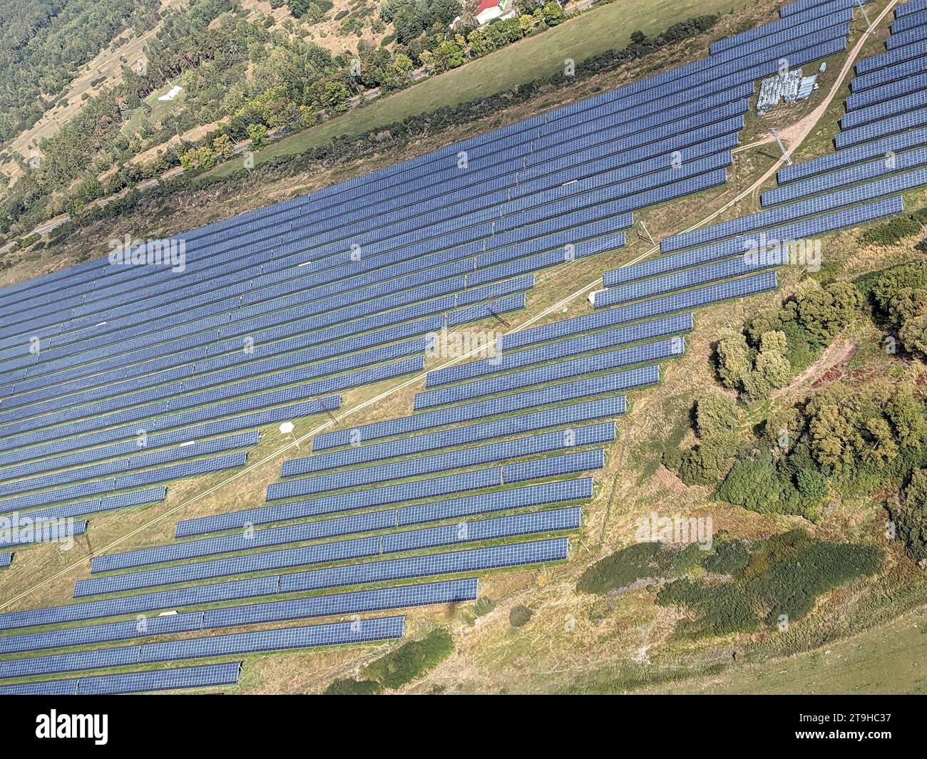 Aerial photo of solar power plant. Many solar energy panels in ...