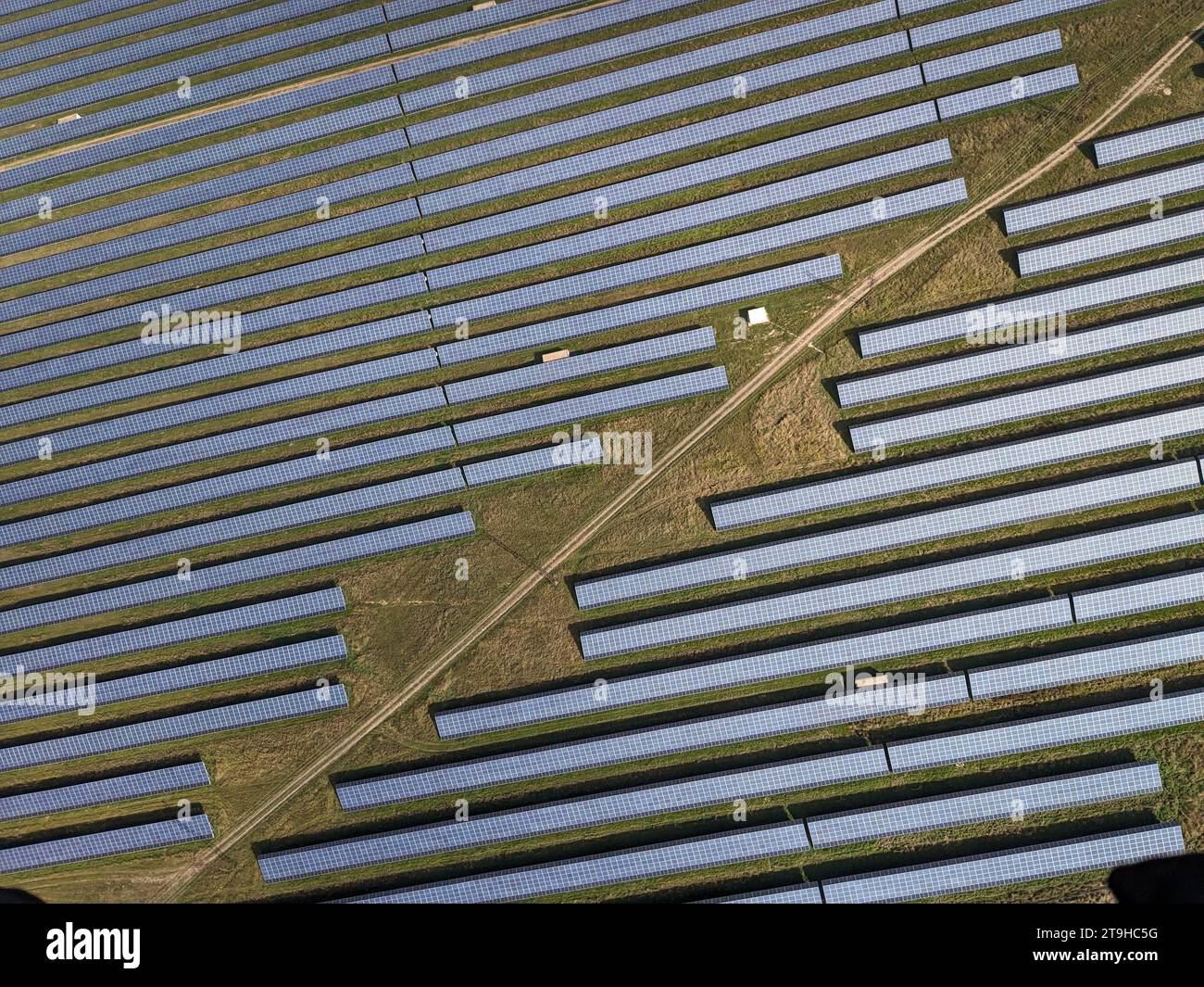 Aerial photo of solar power plant. Many solar energy panels in ...