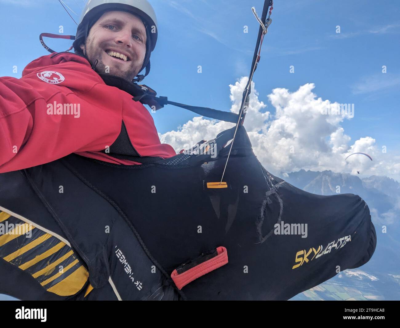 Paragliding selfie,selfie of a paragliding pilot flying high in the ...