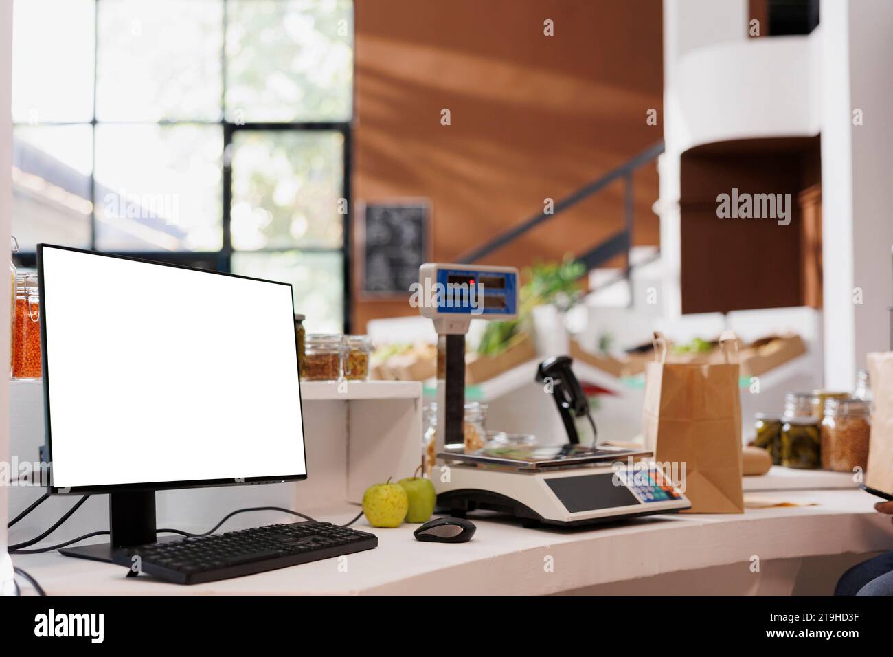 Desktop with the monitor showing a white screen in grocery store ...