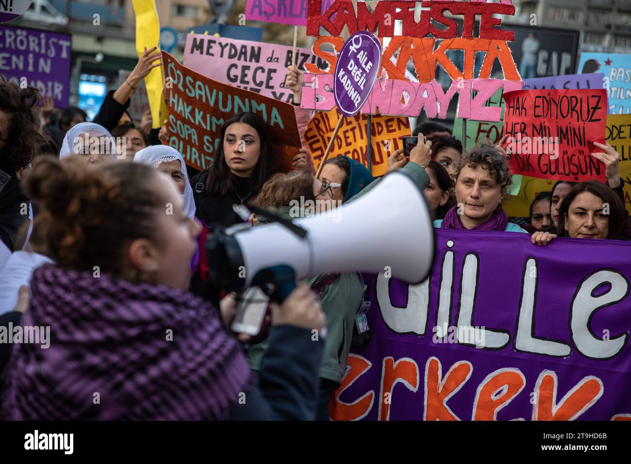 Istanbul, Turkey. 25th Nov, 2023. A woman leading the group speaks on a ...