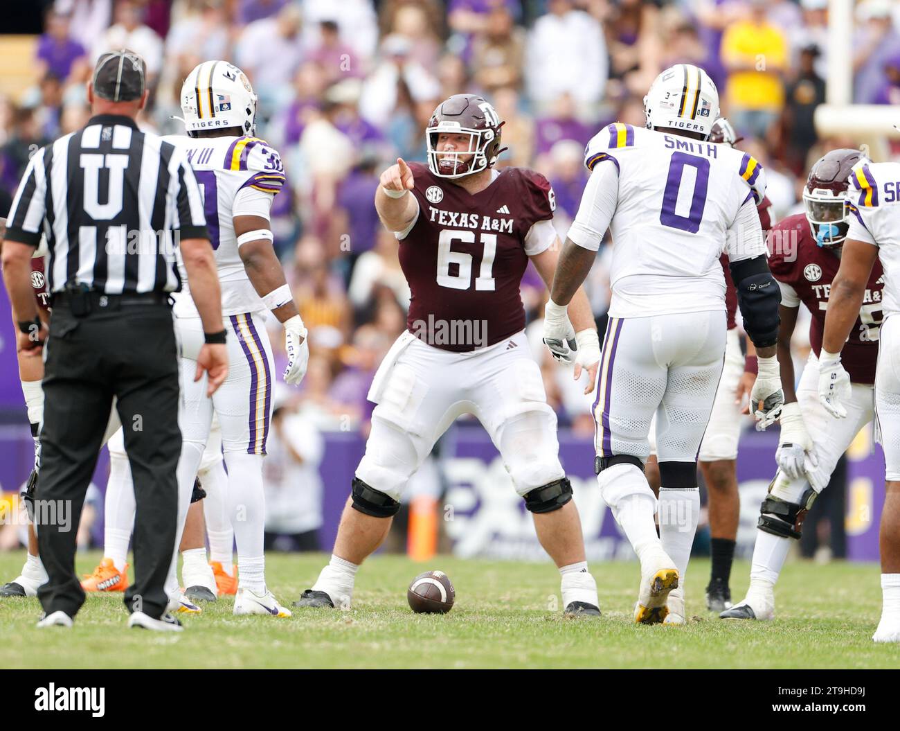 November 25, 2023: Texas A&M center Bryce Foster (61) points at a ...