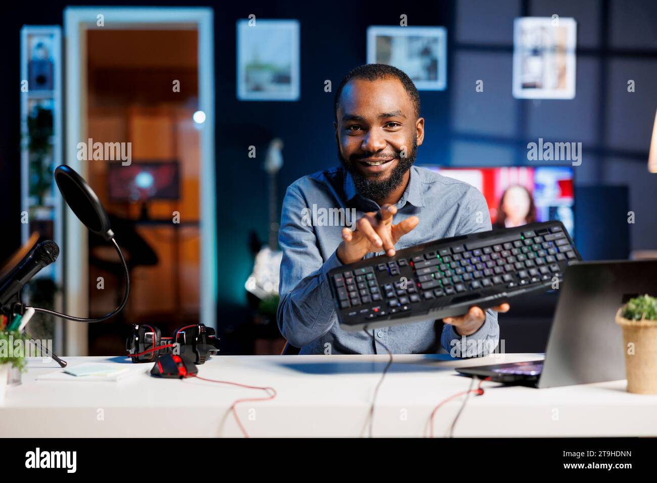 Content creator using high quality recording devices to shoot keyboard ...
