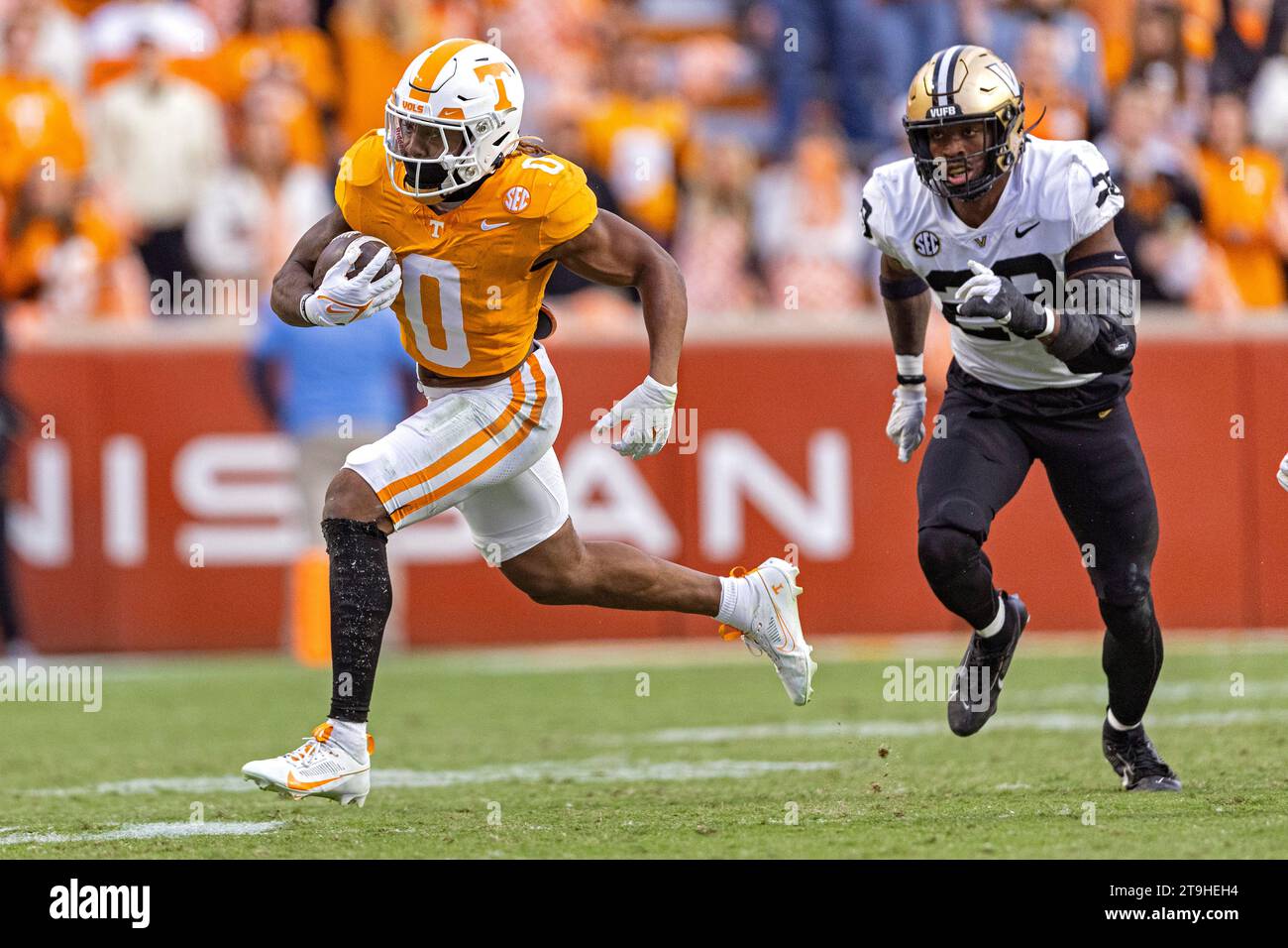 Tennessee running back Jaylen Wright (0) outruns Vanderbilt defensive back Miles Capers (29 ...