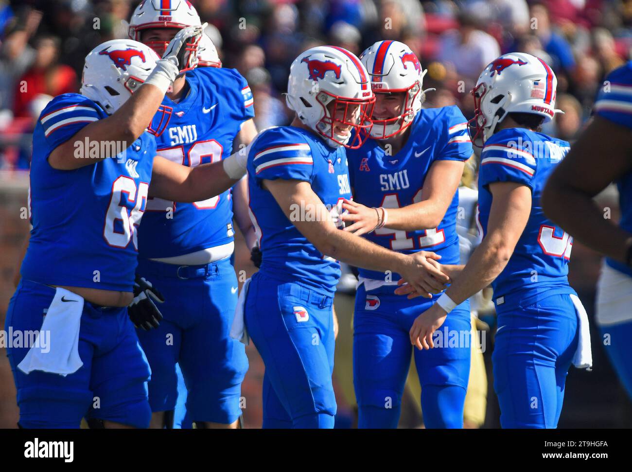 November 25, 2023: SMU Mustangs long snapper Will Benton IV (center ...