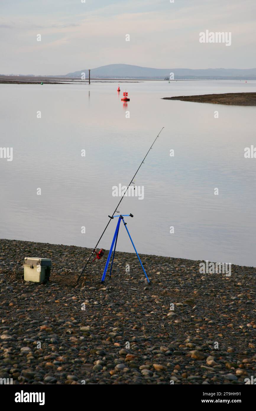 A Fishermans rod and line on the beach at Fleetwood, Lancashire, United ...
