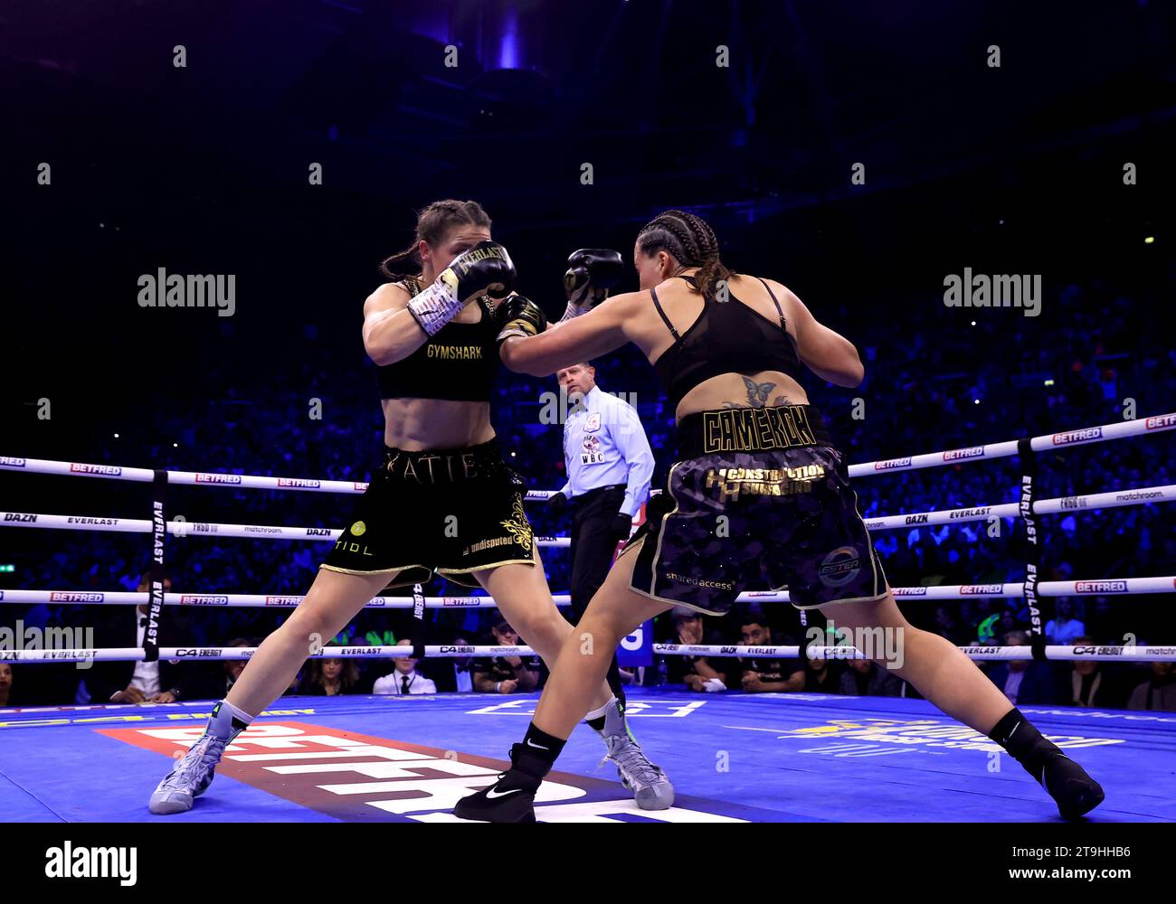 Katie Taylor (left) and Chantelle Cameron in action during their ...