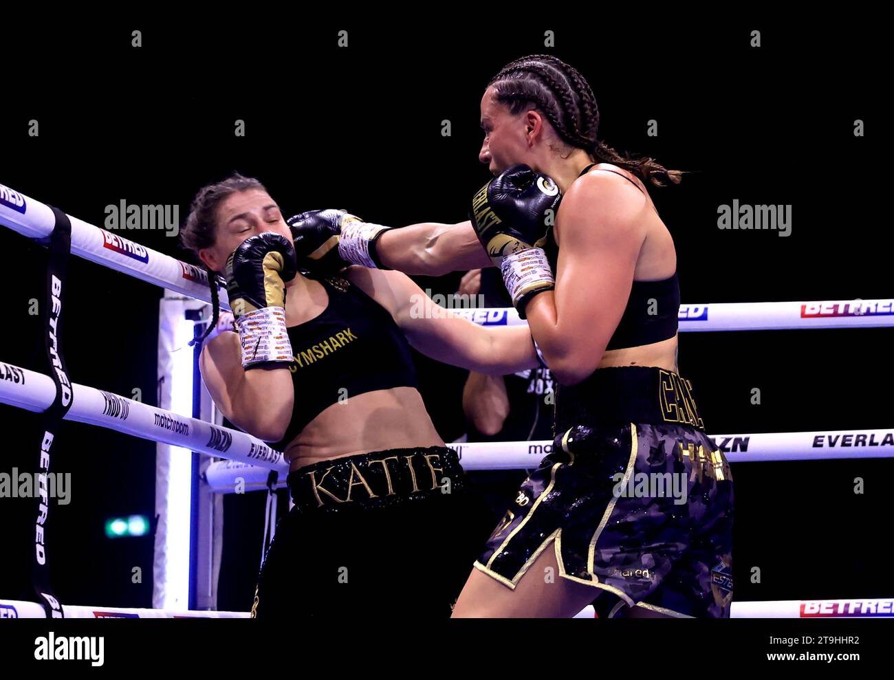 Katie Taylor (left) and Chantelle Cameron in action during their ...