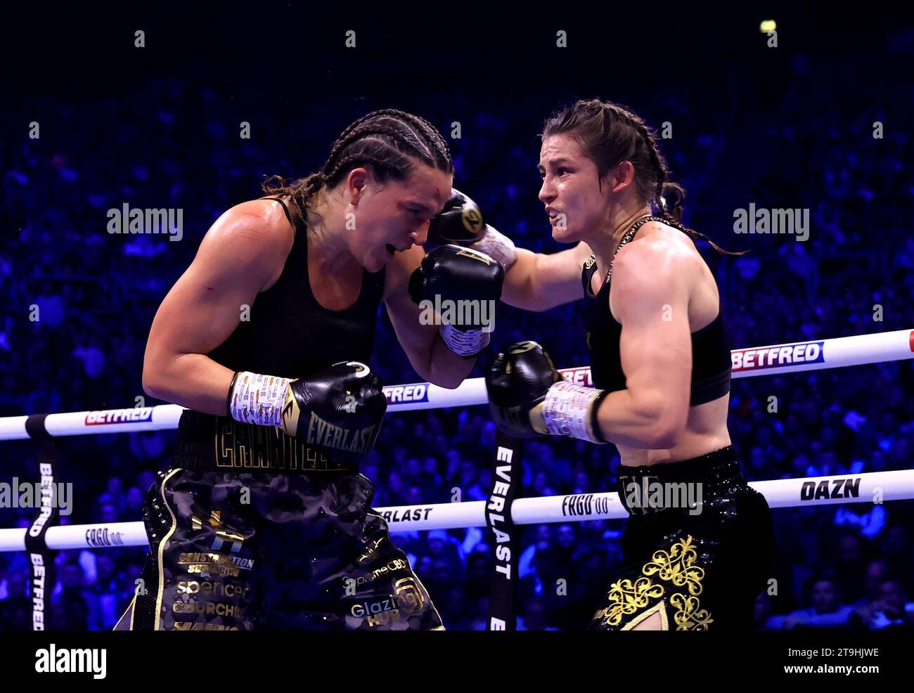 Katie Taylor (right) and Chantelle Cameron in action during their ...