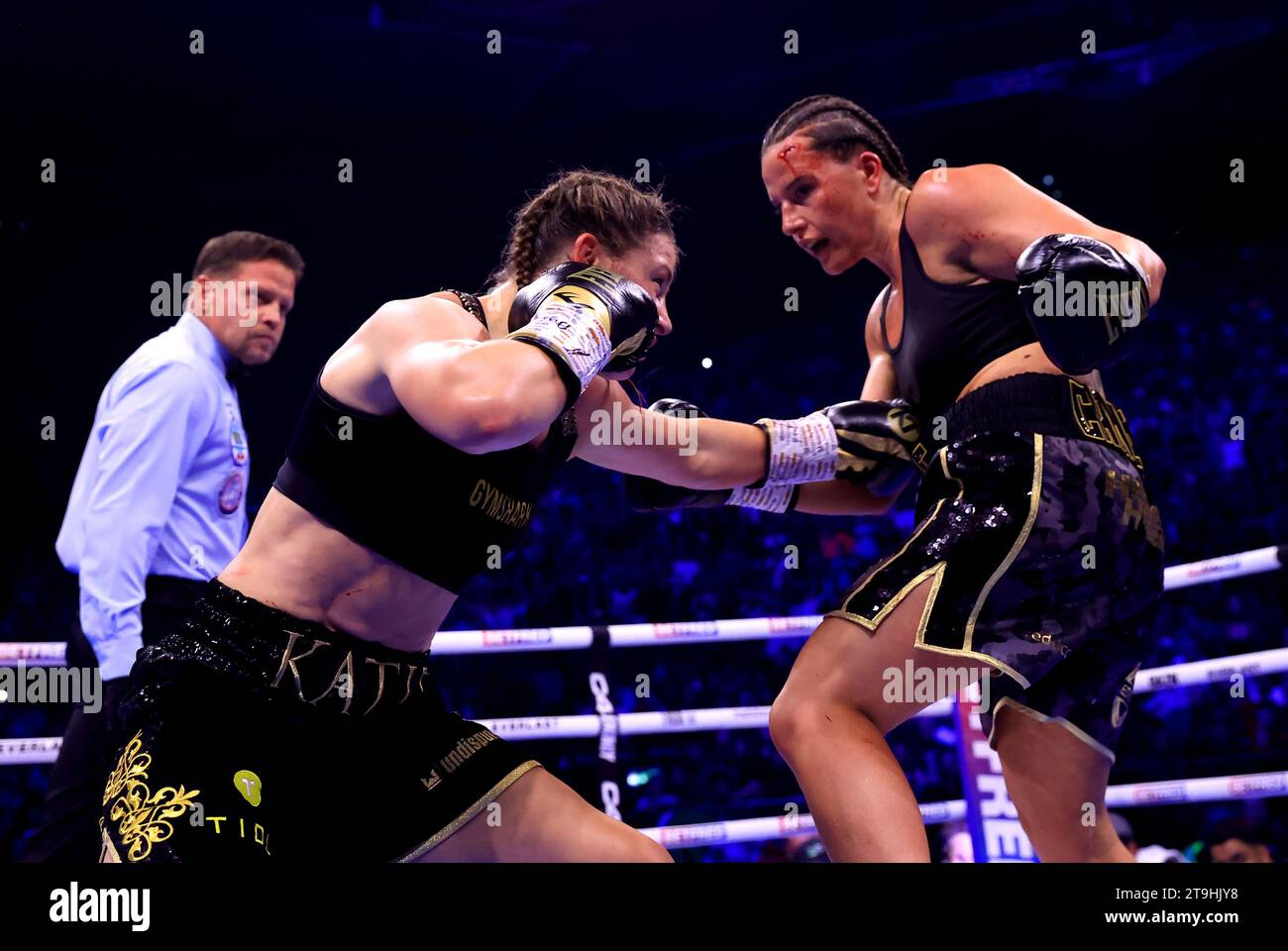 Katie Taylor (left) and Chantelle Cameron in action during their ...