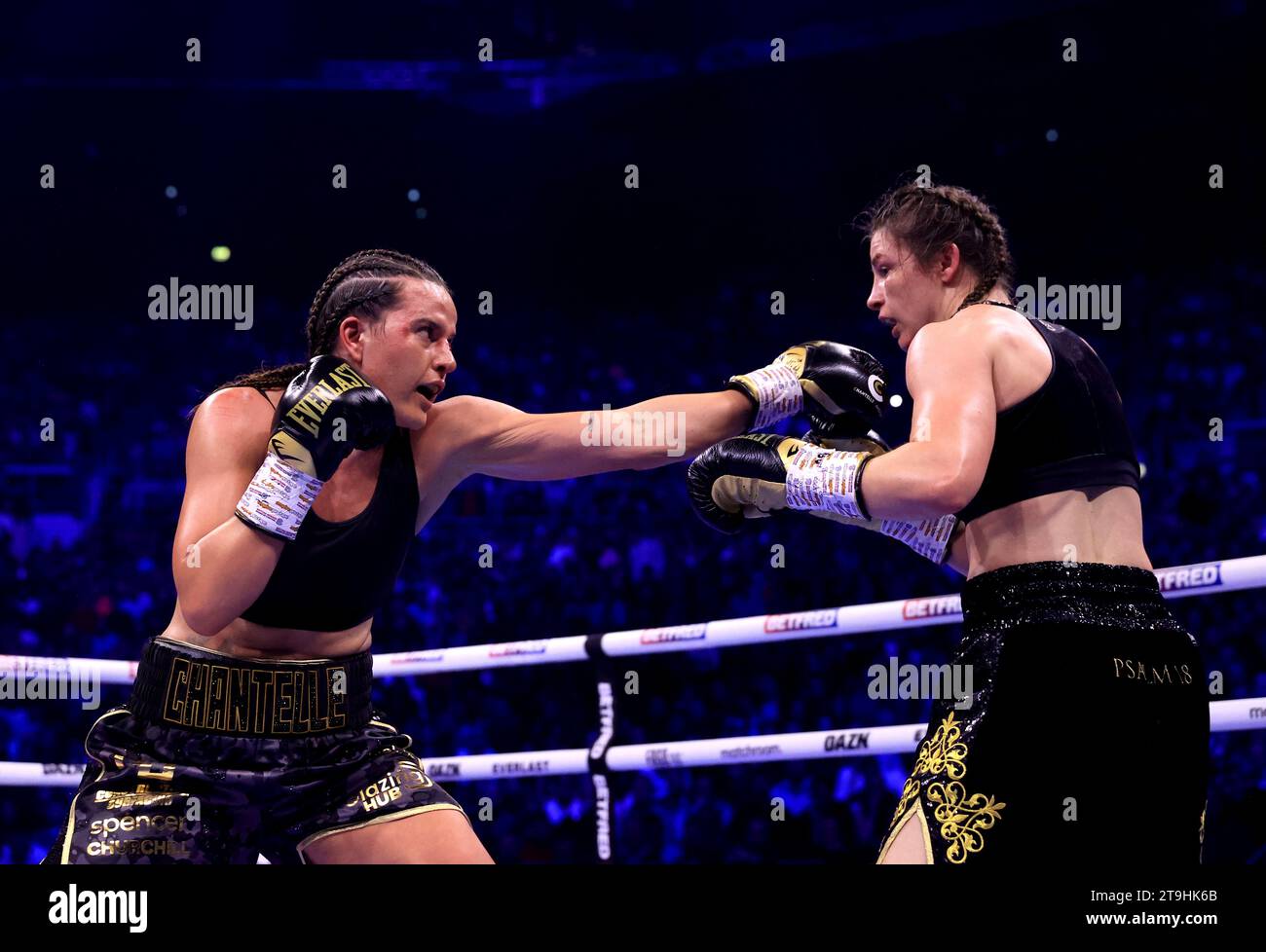 Katie Taylor (right) and Chantelle Cameron in action during their ...