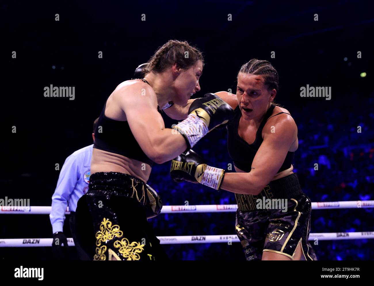 Katie Taylor (left) and Chantelle Cameron in action during their ...