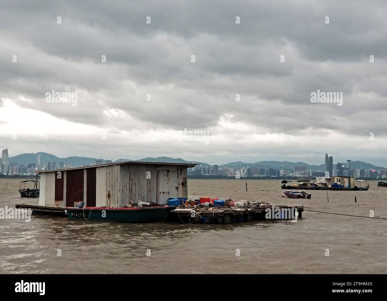 Floating barges near the Shenzen Bay fishing village in Hong Kong's New ...