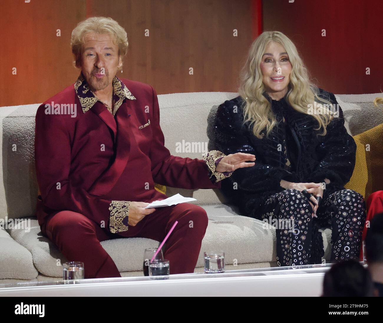 Offenburg, Germany. 26th Nov, 2023. Presenter Thomas Gottschalk talks to singer Cher during the ...