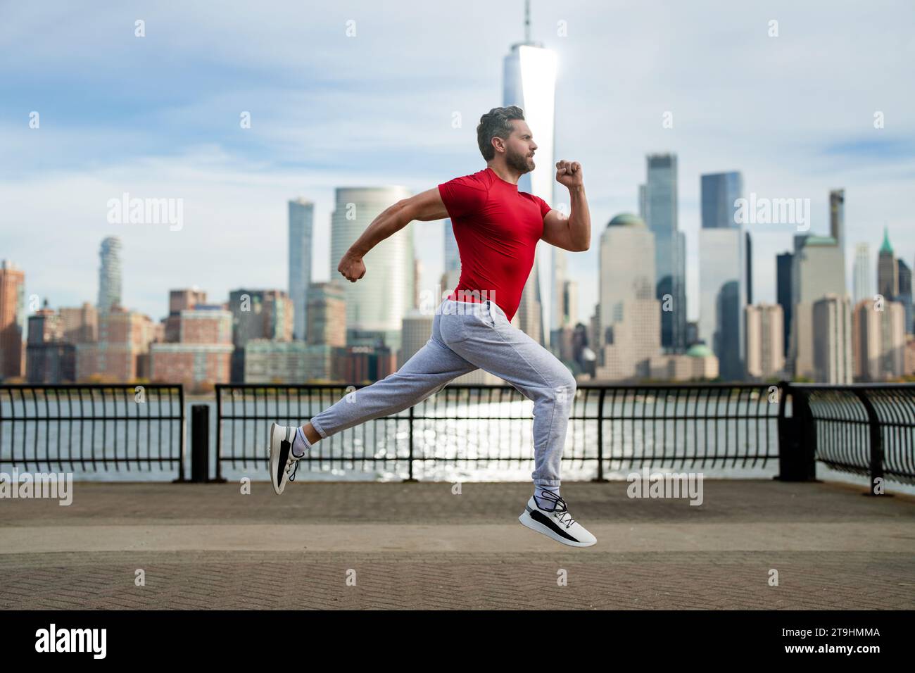 Run outdoor. Running man jogging outside in street. Mature man runner ...