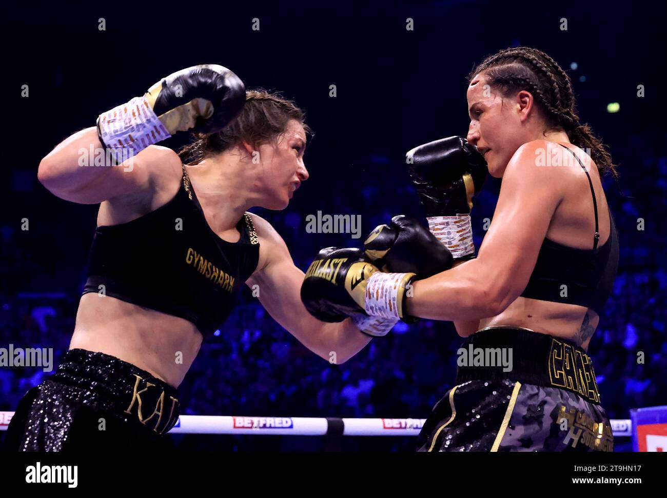 Katie Taylor (left) and Chantelle Cameron in action during their ...