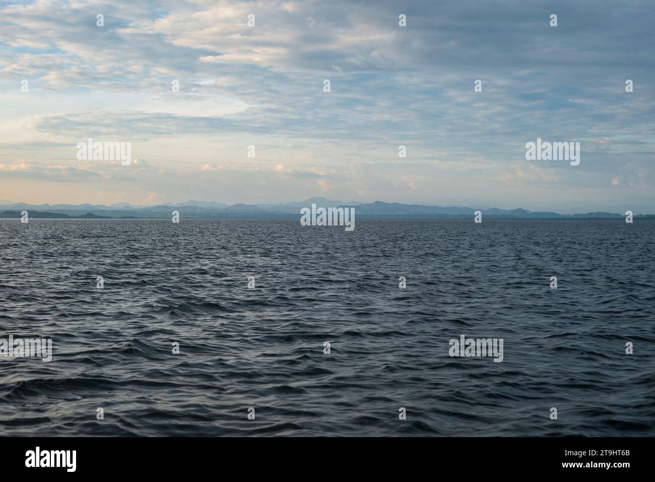 Coastline Seen From Afar with a Volcanic Mountain, Lush Vegetation ...