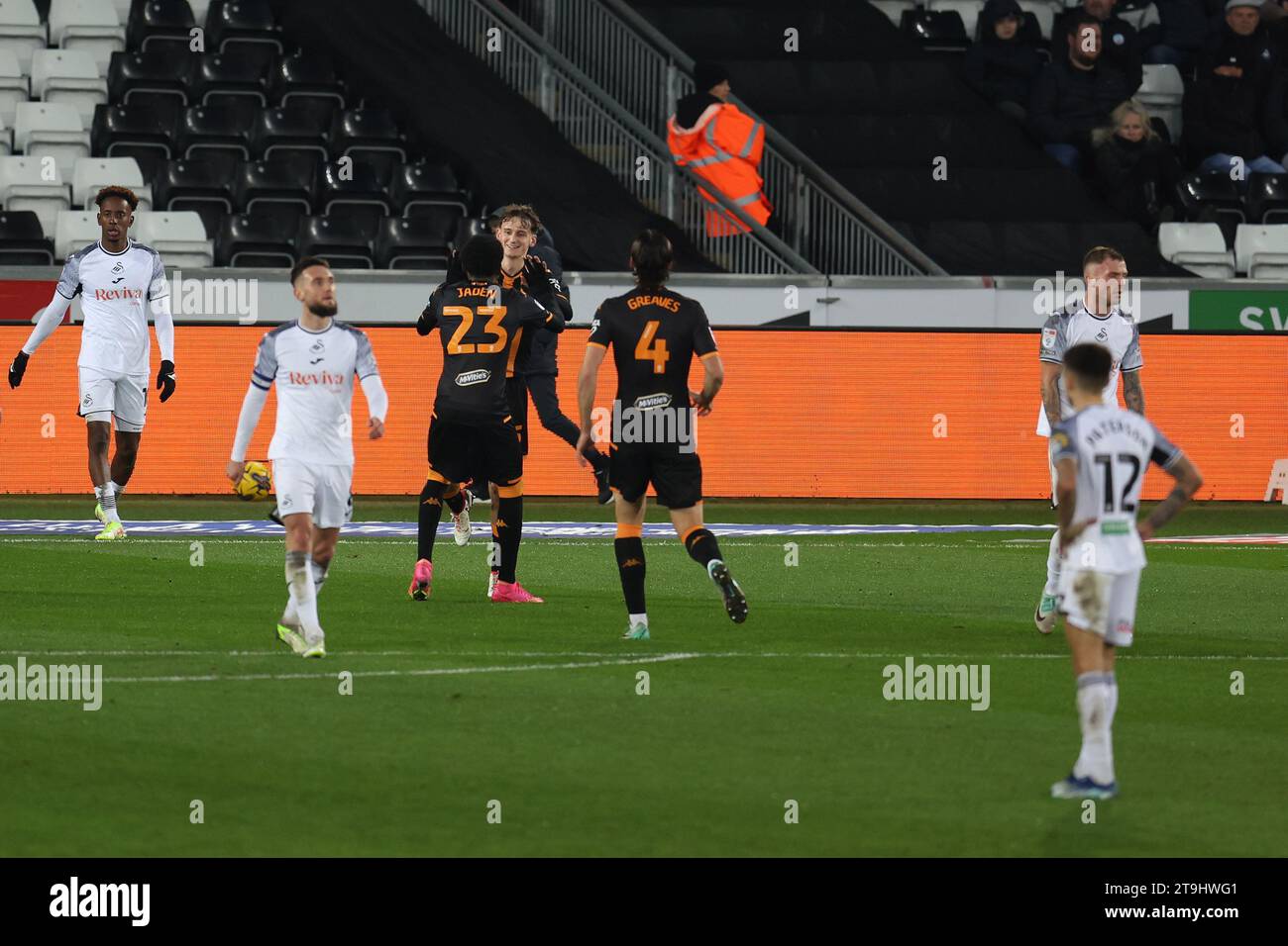 Swansea, UK. 25th Nov, 2023. Tyler Morton of Hull City (c) celebrates ...