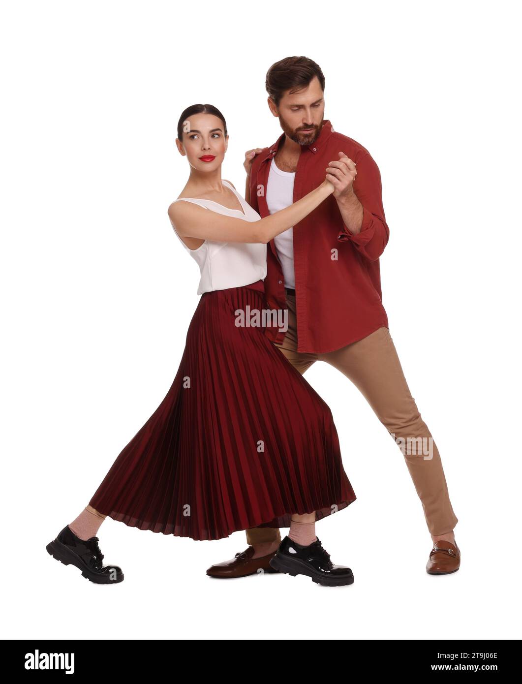 Beautiful couple dancing together on white background Stock Photo - Alamy