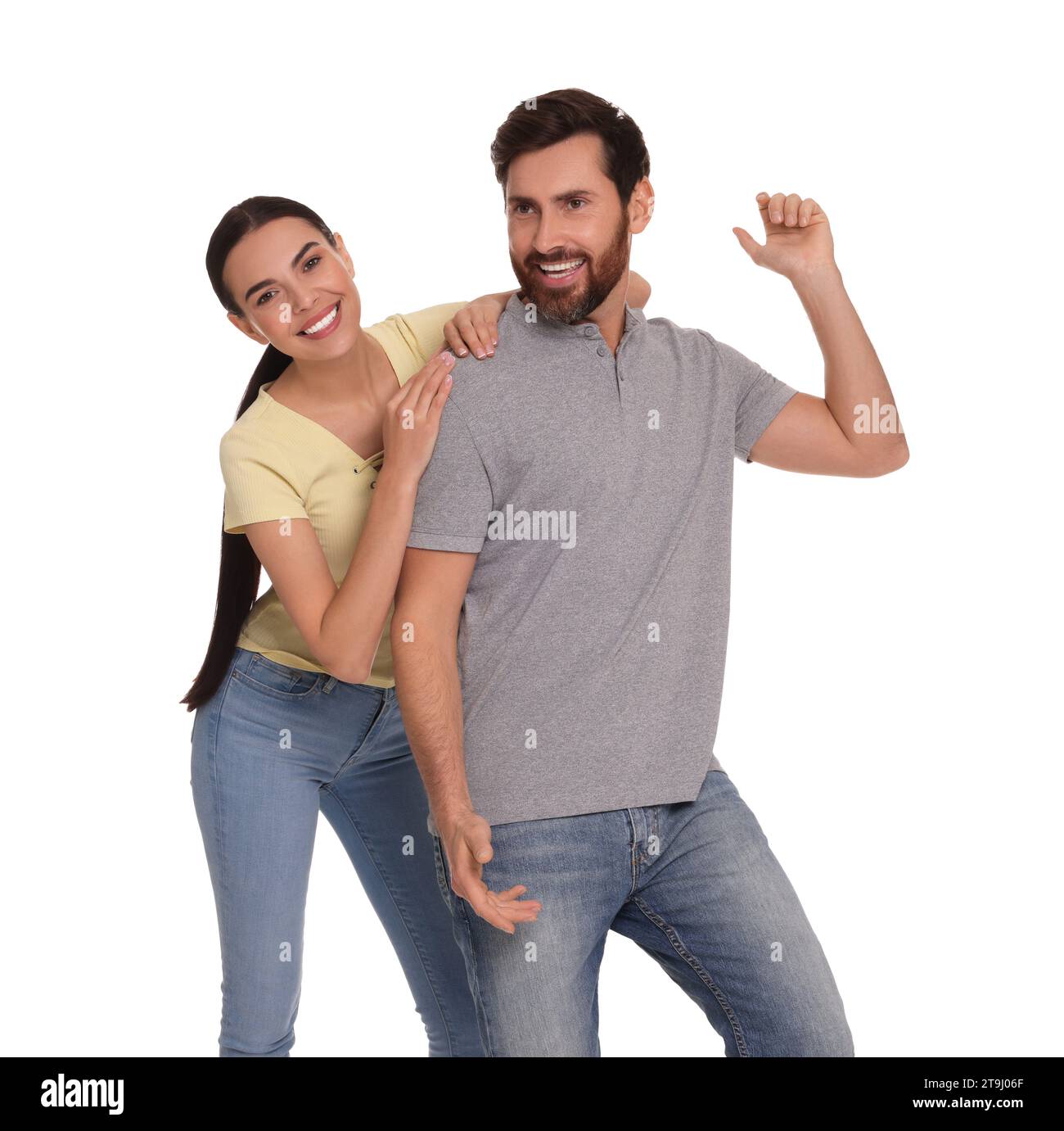 Happy couple dancing together on white background Stock Photo - Alamy