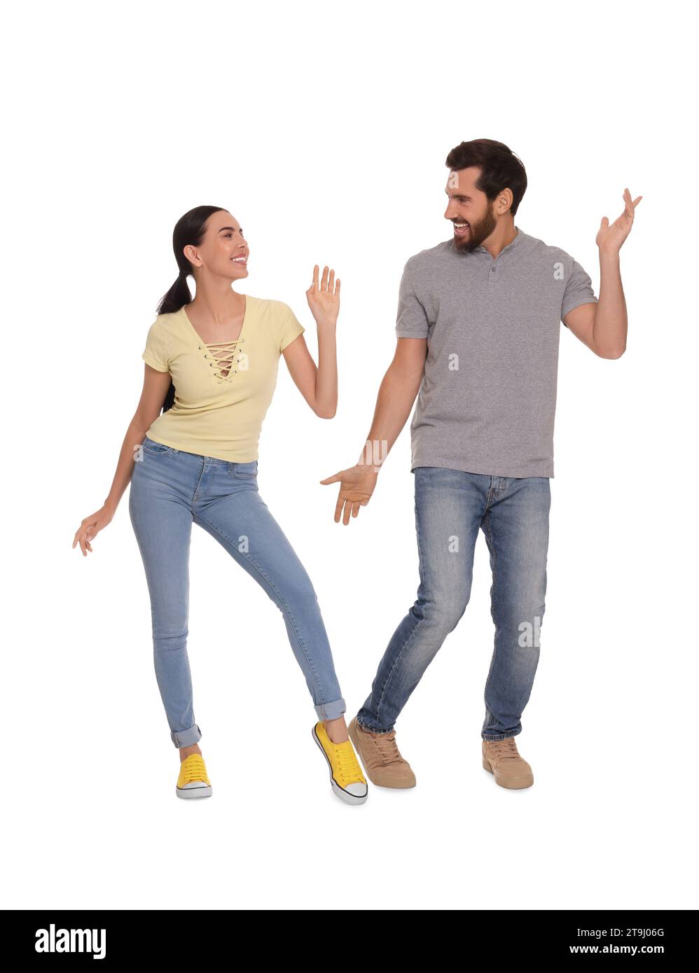 Happy couple dancing together on white background Stock Photo - Alamy