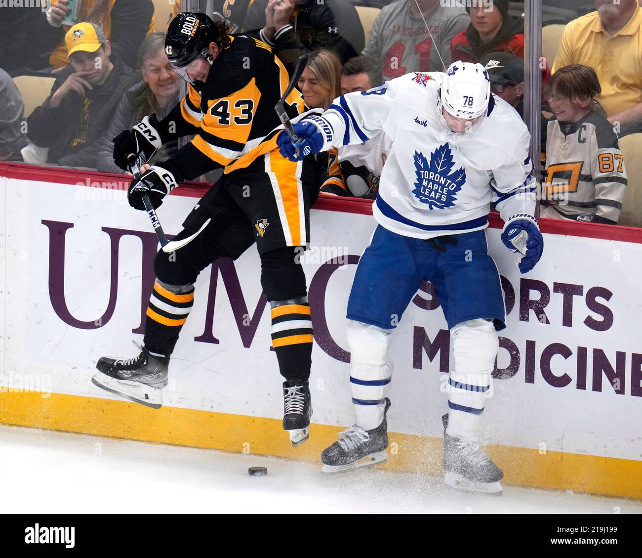 Pittsburgh Penguins' Jansen Harkins (43) checks Toronto Maple Leafs' TJ ...
