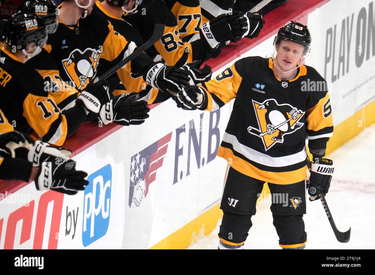 Pittsburgh Penguins' Jake Guentzel (59) returns to the bench after ...