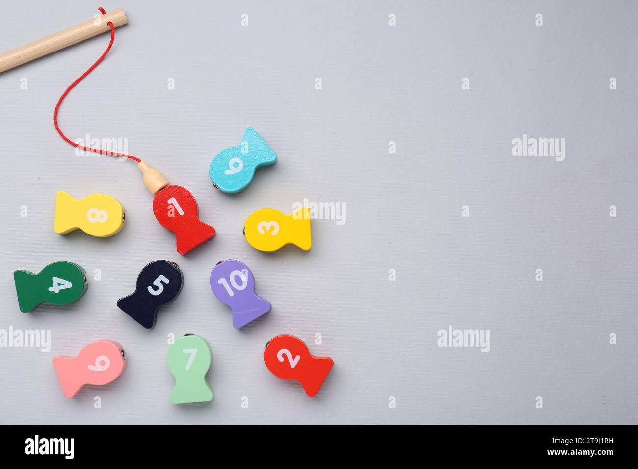 Educational game Fishing for Numbers on light grey background, flat lay ...