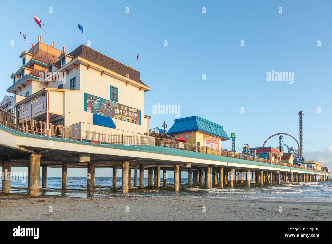 Galveston, USA - October 28, 2023: Pleasure Pier seen from the water in ...