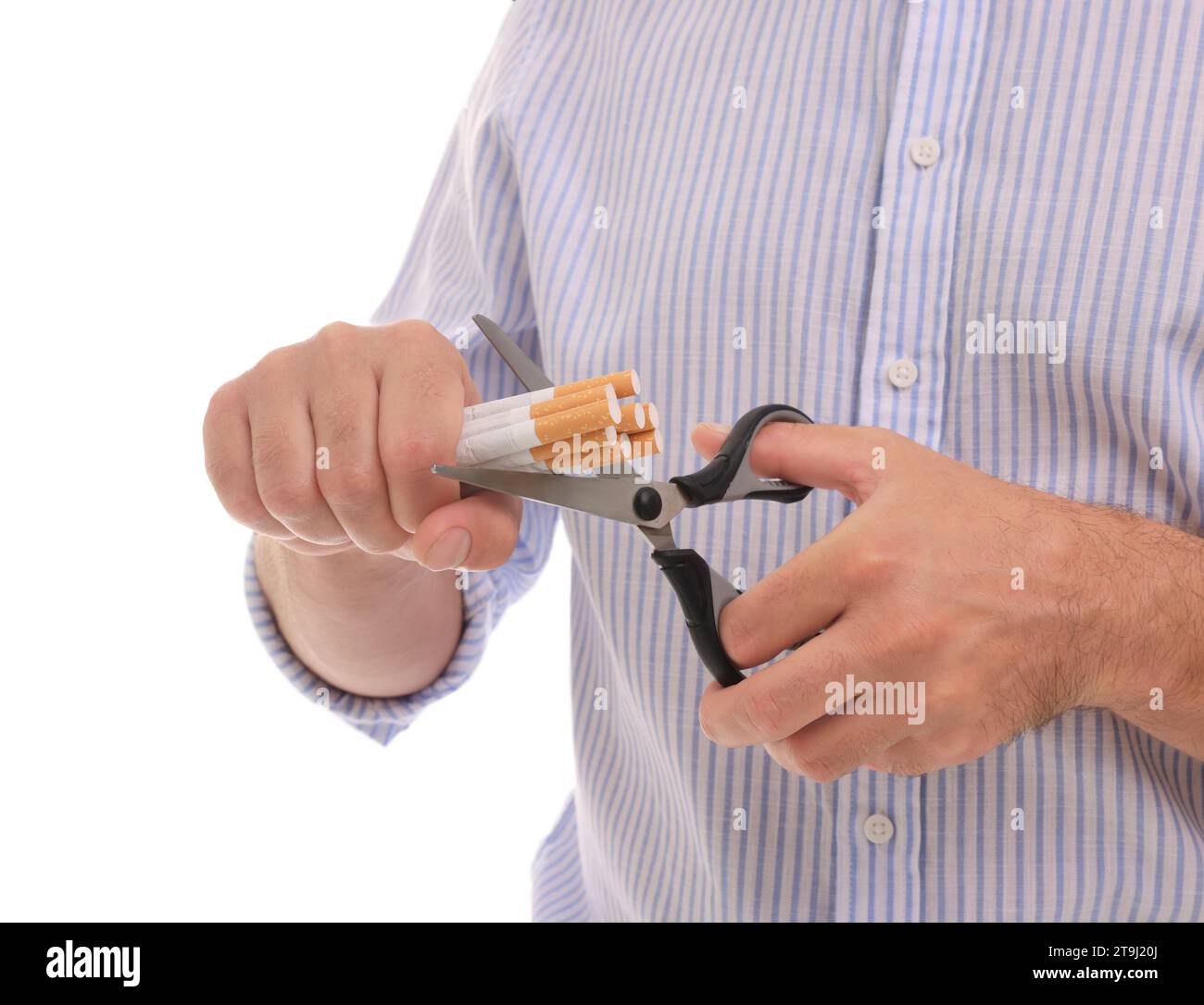 Stop smoking concept. Man cutting cigarettes on white background ...