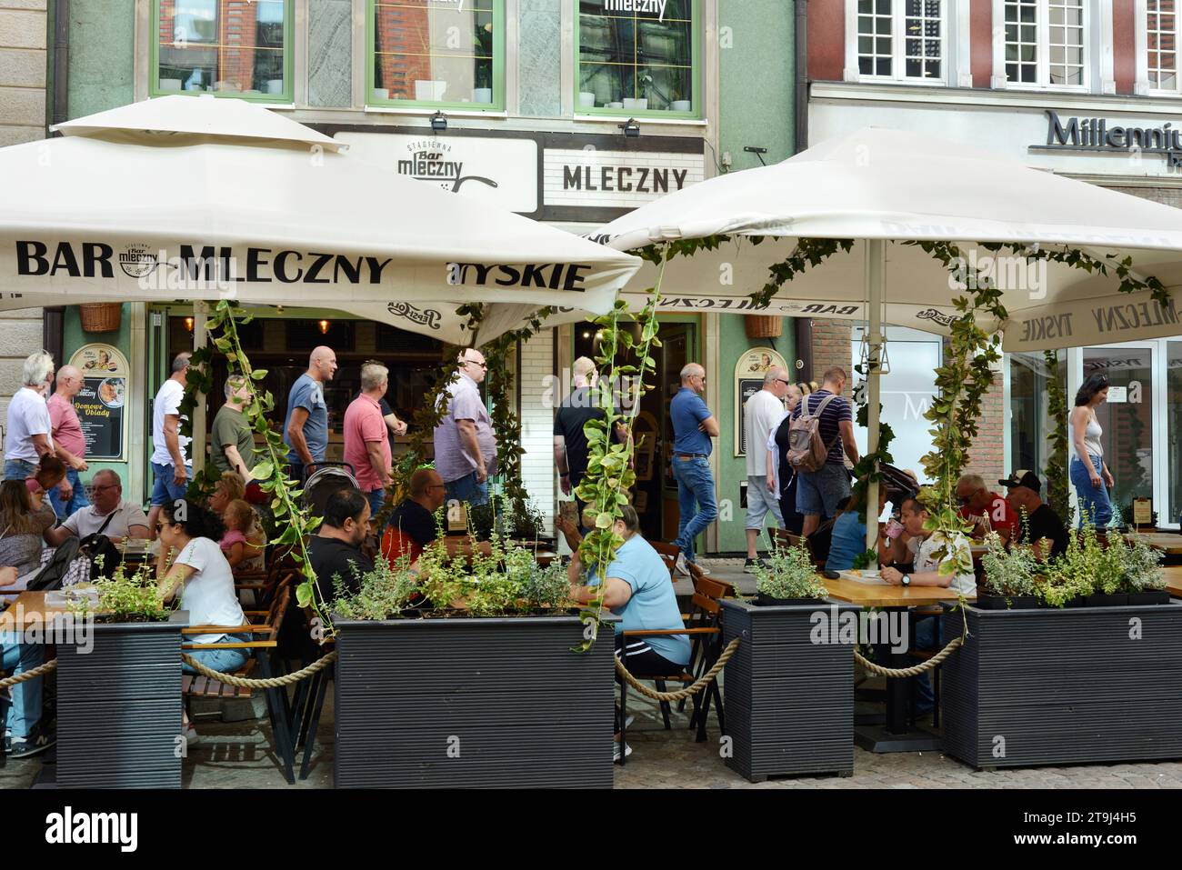 Customers and tourists outside the Stagiewna Milk Bar or Bar Mleczny in ...