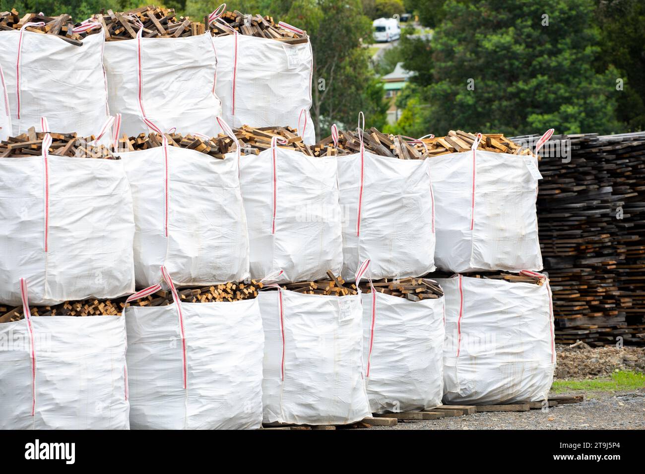 Firewood Sacks of bulk dried firewood, wide shot Stock Photo - Alamy