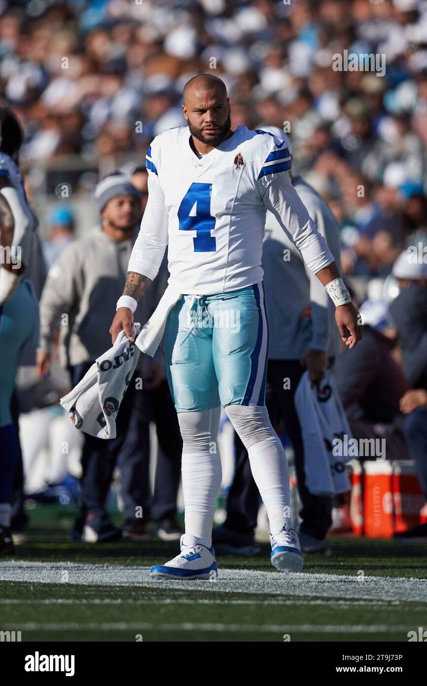 Dallas Cowboys quarterback Dak Prescott (4) keeps loose on the sideline ...
