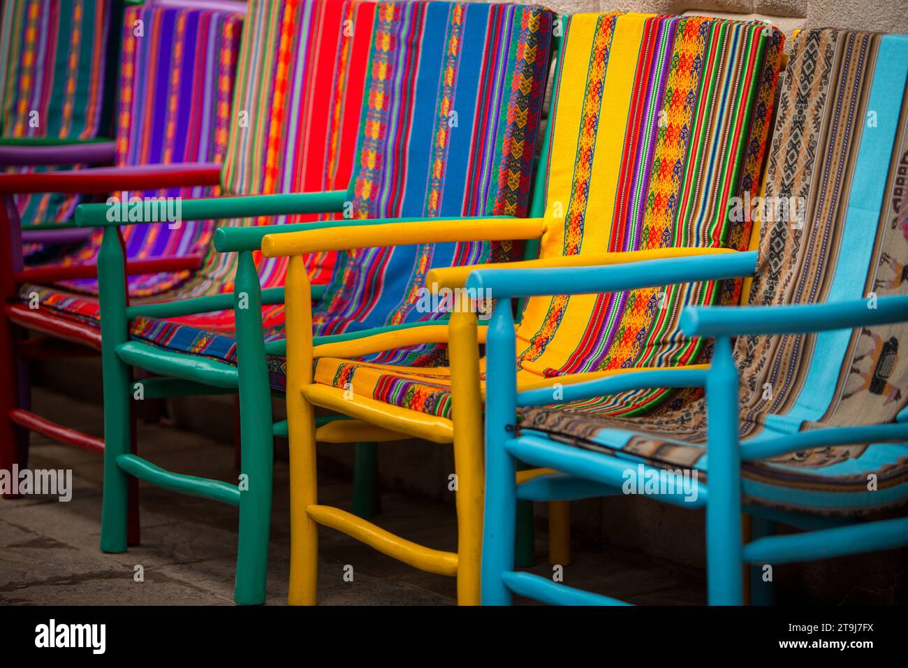 Handmade Colorful Peruvian Chairs in a Row Stock Photo - Alamy