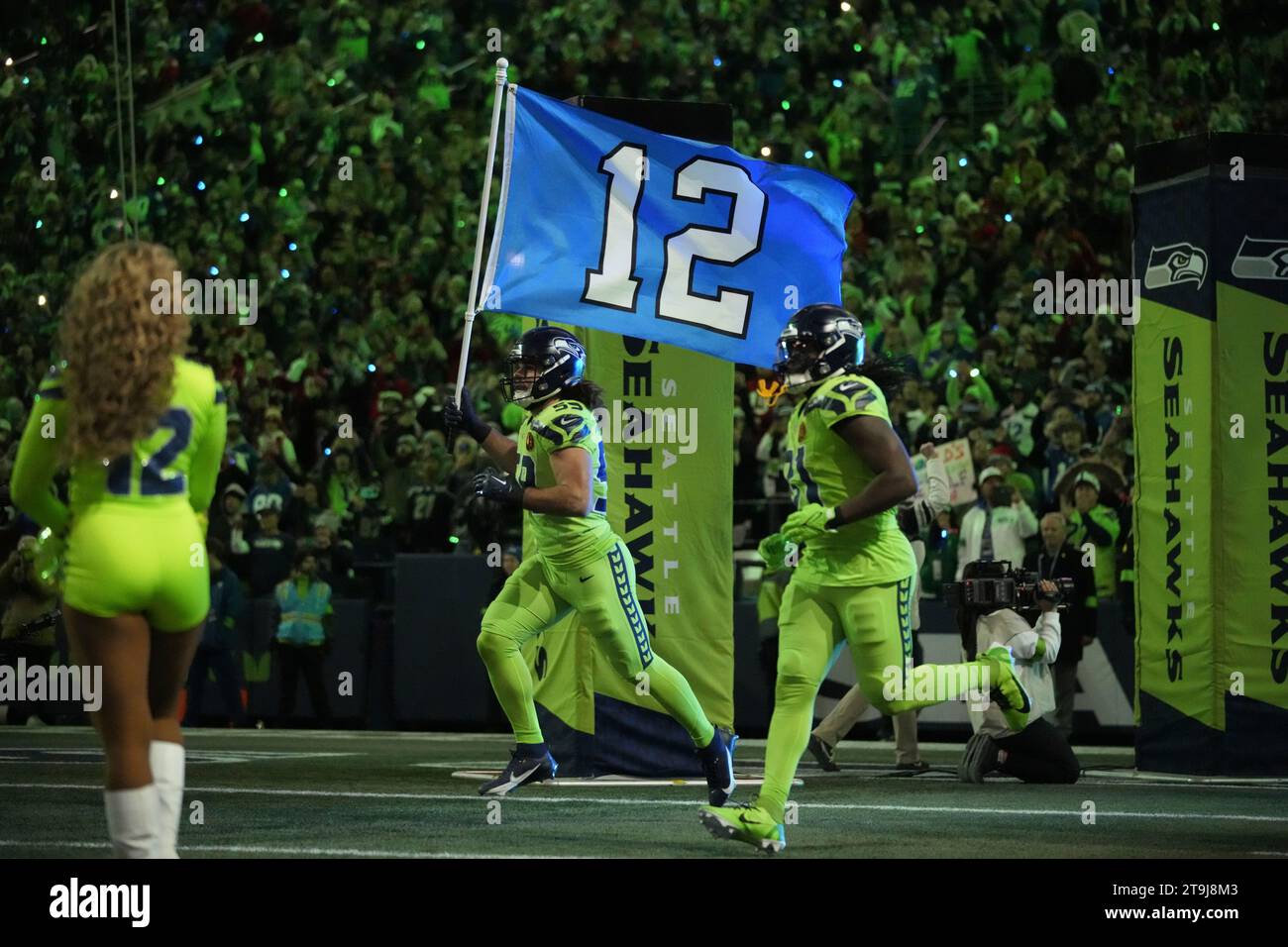 Seattle Seahawks linebacker Jon Rhattigan (59) runs out on to the field ...