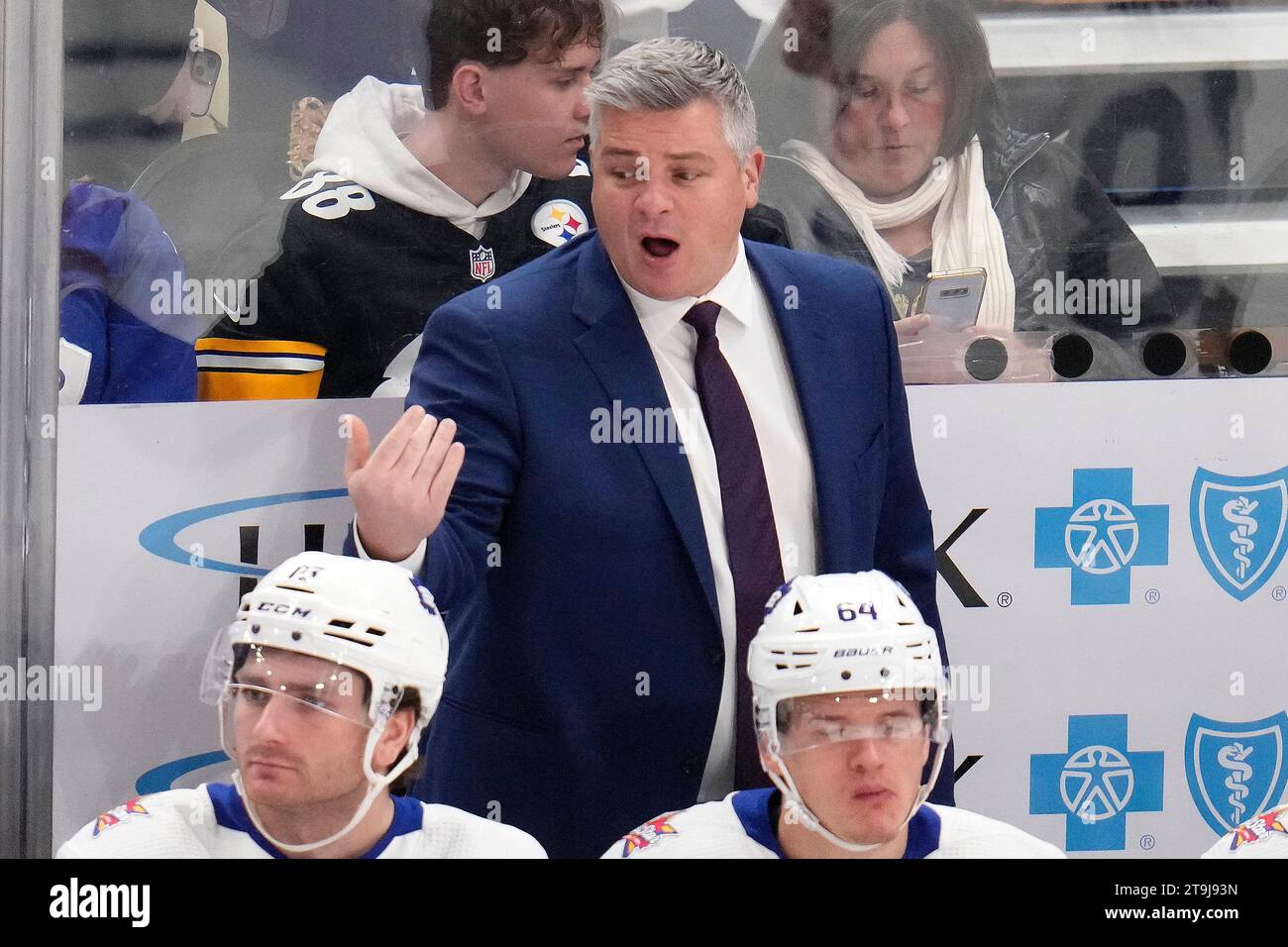 Toronto Maple Leafs head coach Sheldon Keefe, top center, gives ...