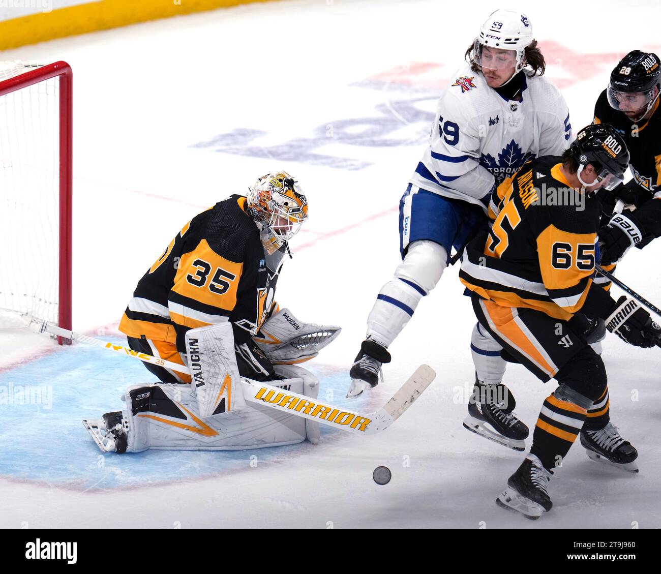 Pittsburgh Penguins goaltender Tristan Jarry (35) stops a shot with ...